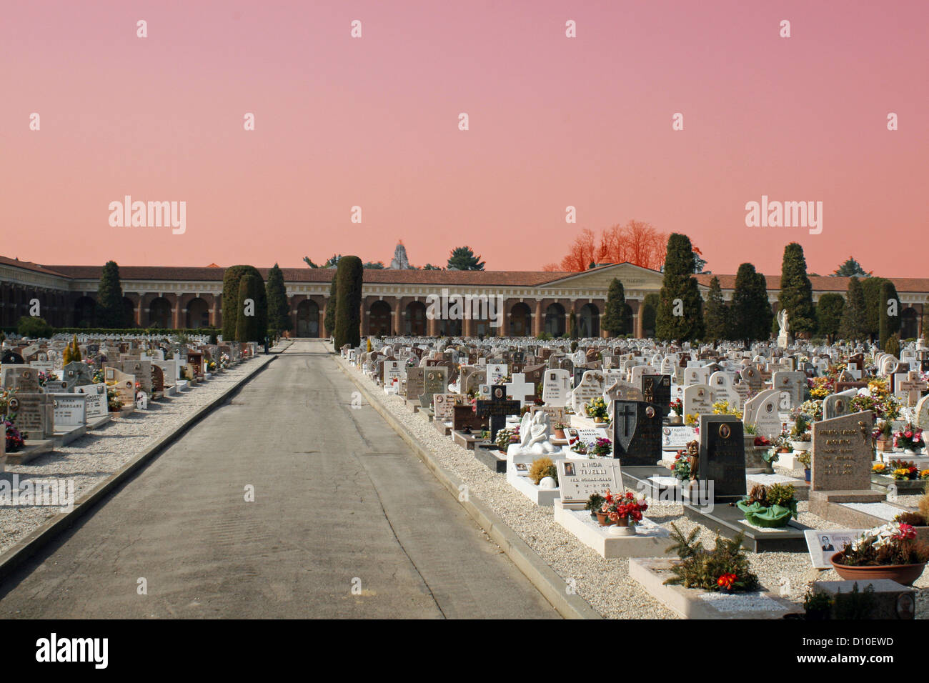 graves headstones and crucifixes of a cemetery outdoor in Italy Stock ...