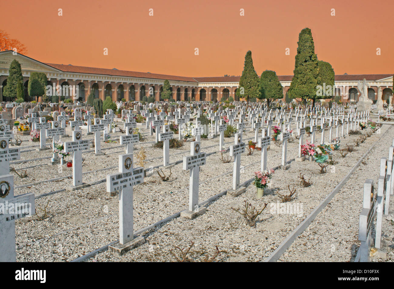 graves headstones and crucifixes of a cemetery in Italy Stock Photo - Alamy