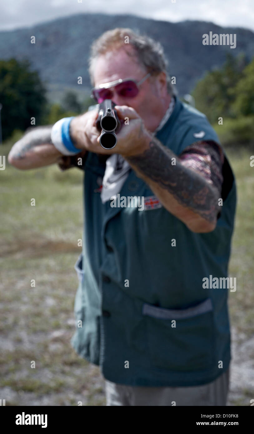 Man using a shotgun hi-res stock photography and images - Alamy