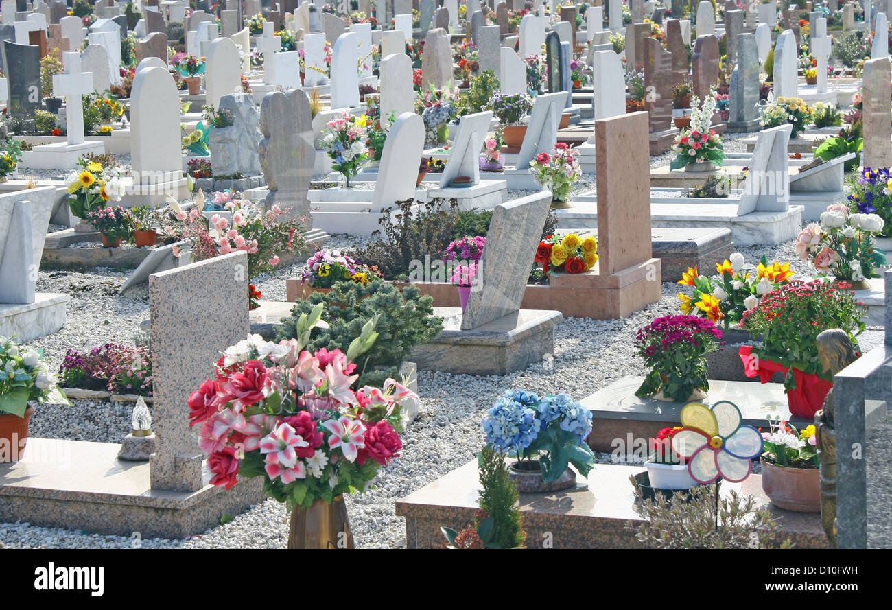 graves headstones and crucifixes of a cemetery in Italy Stock Photo - Alamy