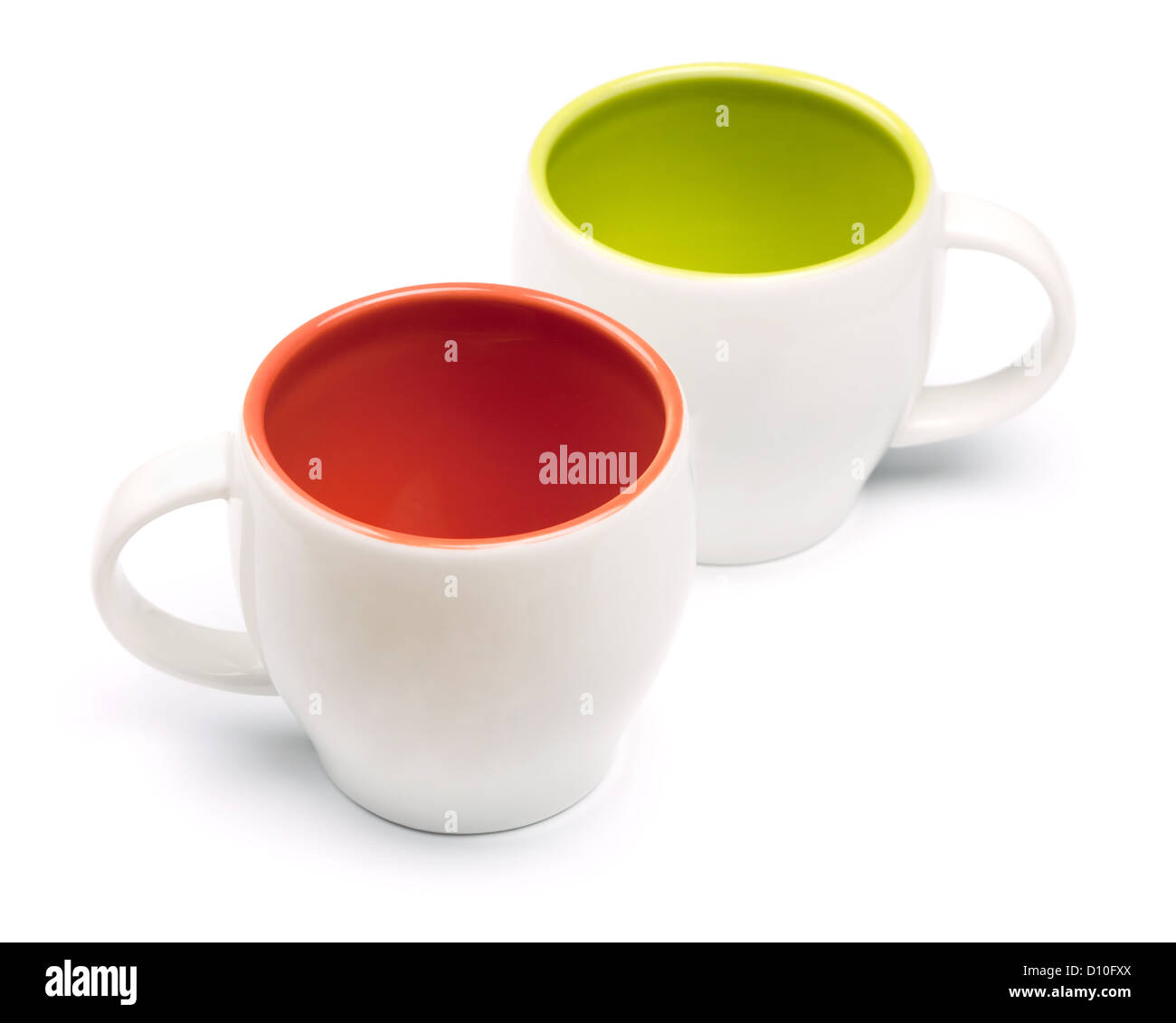 Two empty color coffee cups. Isolated on white background Stock Photo ...