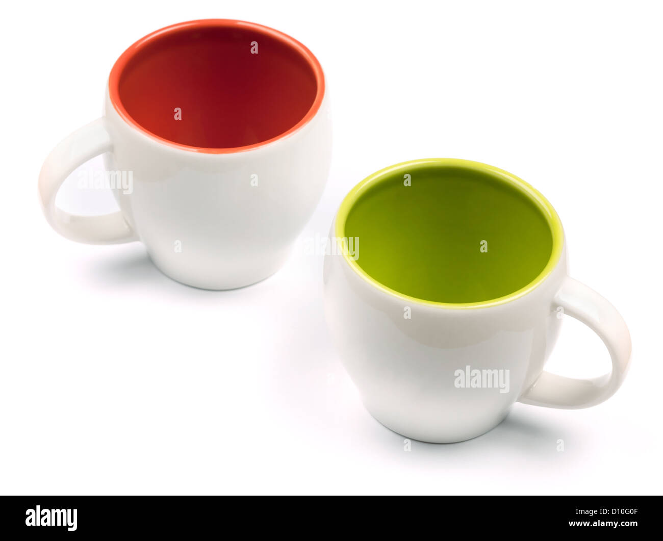 Two empty color coffee cups. Isolated on white background Stock Photo ...