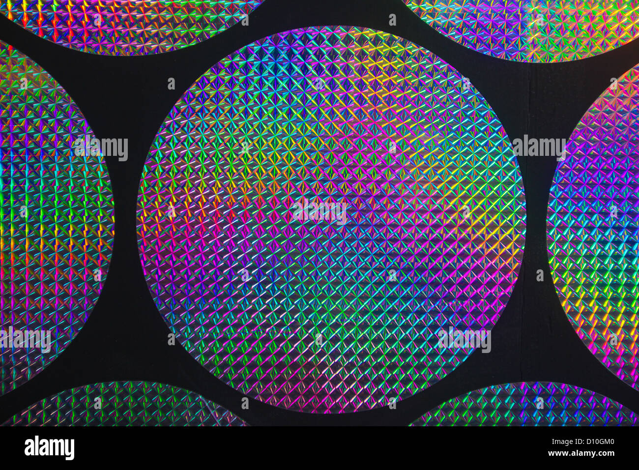Circular holographic patterns of on background Stock Photo - Alamy