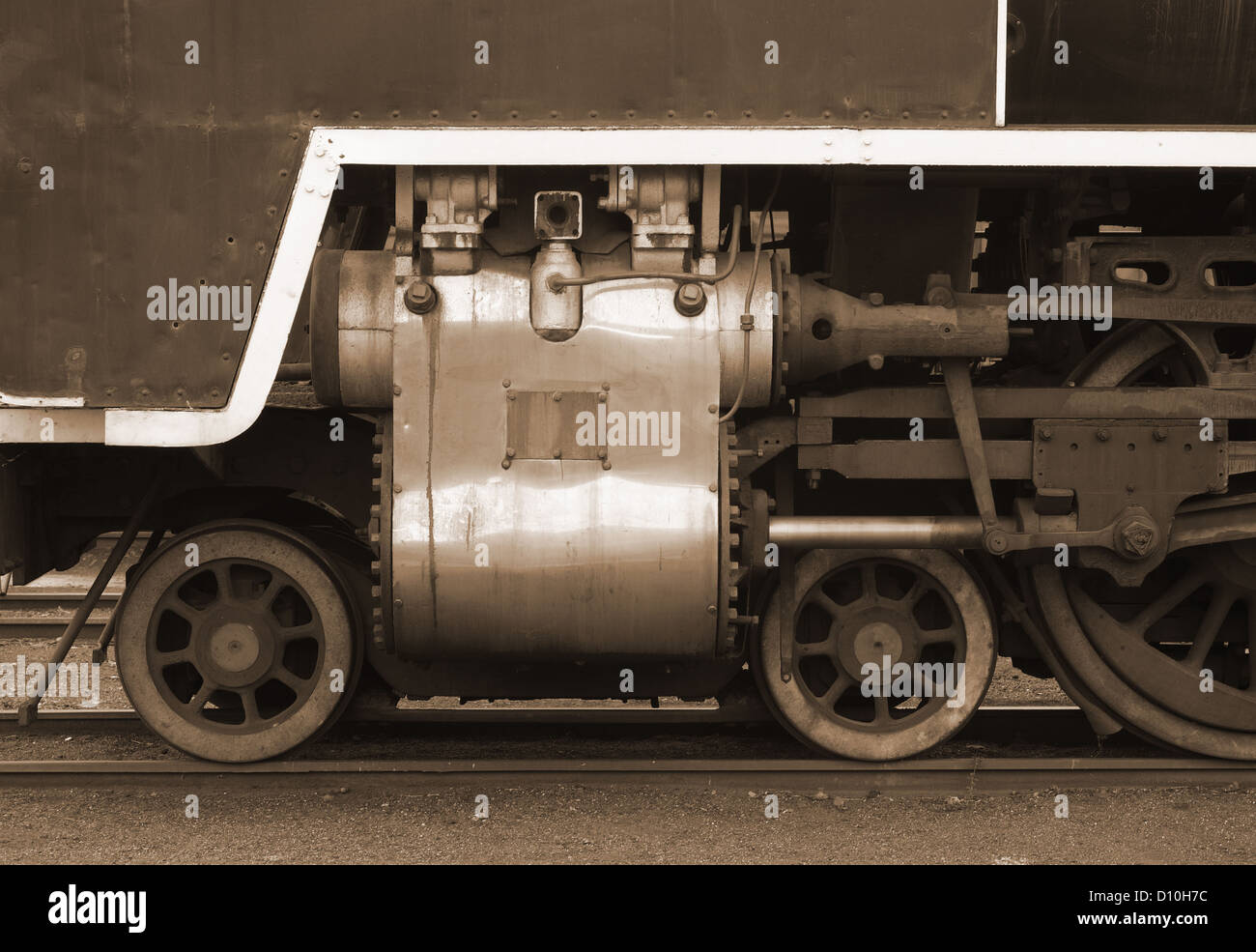 Vintage sepia steam train piston and gear wheels Stock Photo - Alamy