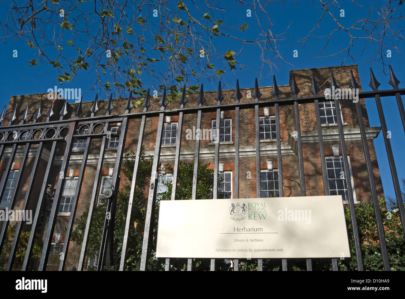 frontage with sign of the herbarium library and archive of kew gardens ...