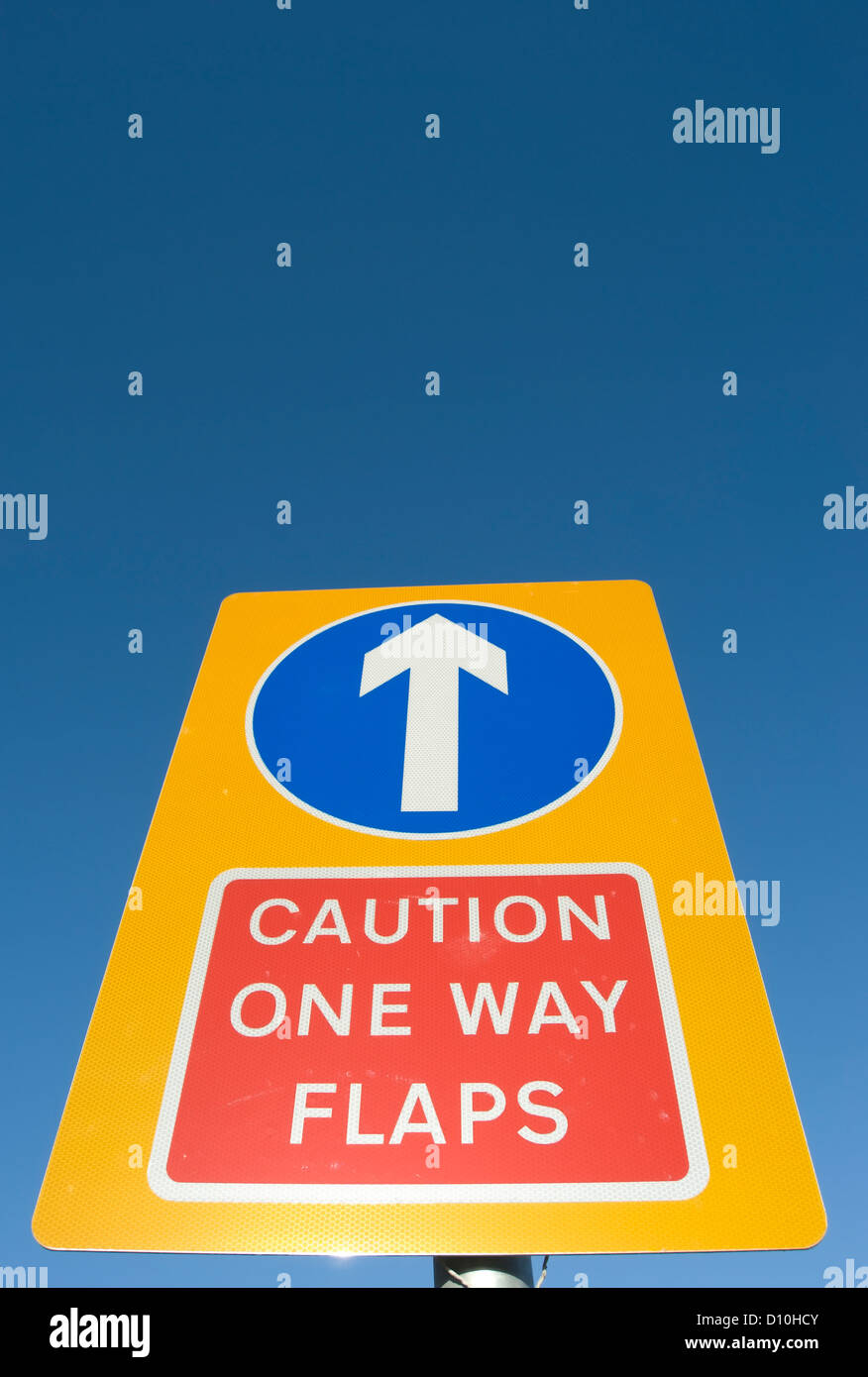 british road sign stating caution one way flaps Stock Photo - Alamy