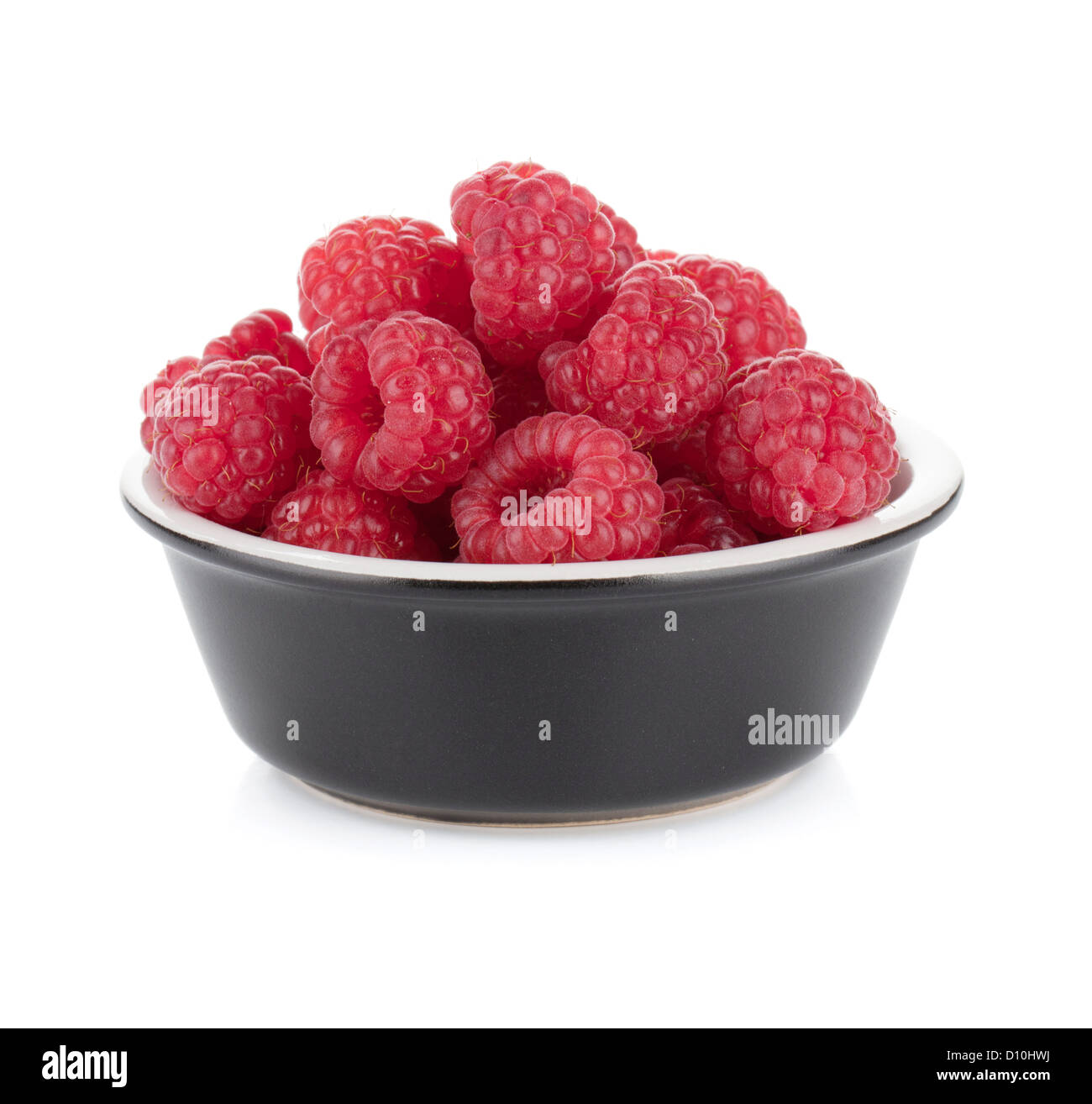 Ripe raspberry small bowl. Isolated on white background Stock Photo - Alamy