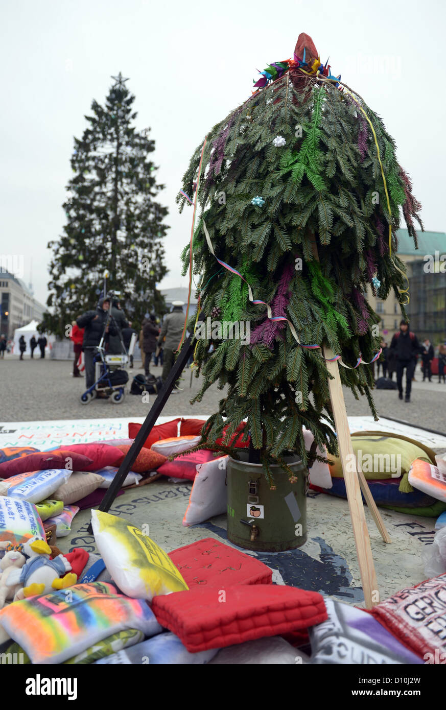 Christmas tree stands upside down in the arrea of the refugee camp in ...