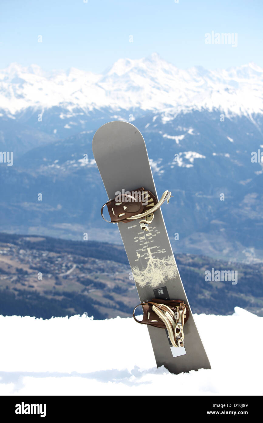 top of mountains in blue sky snowboard on it Stock Photo - Alamy