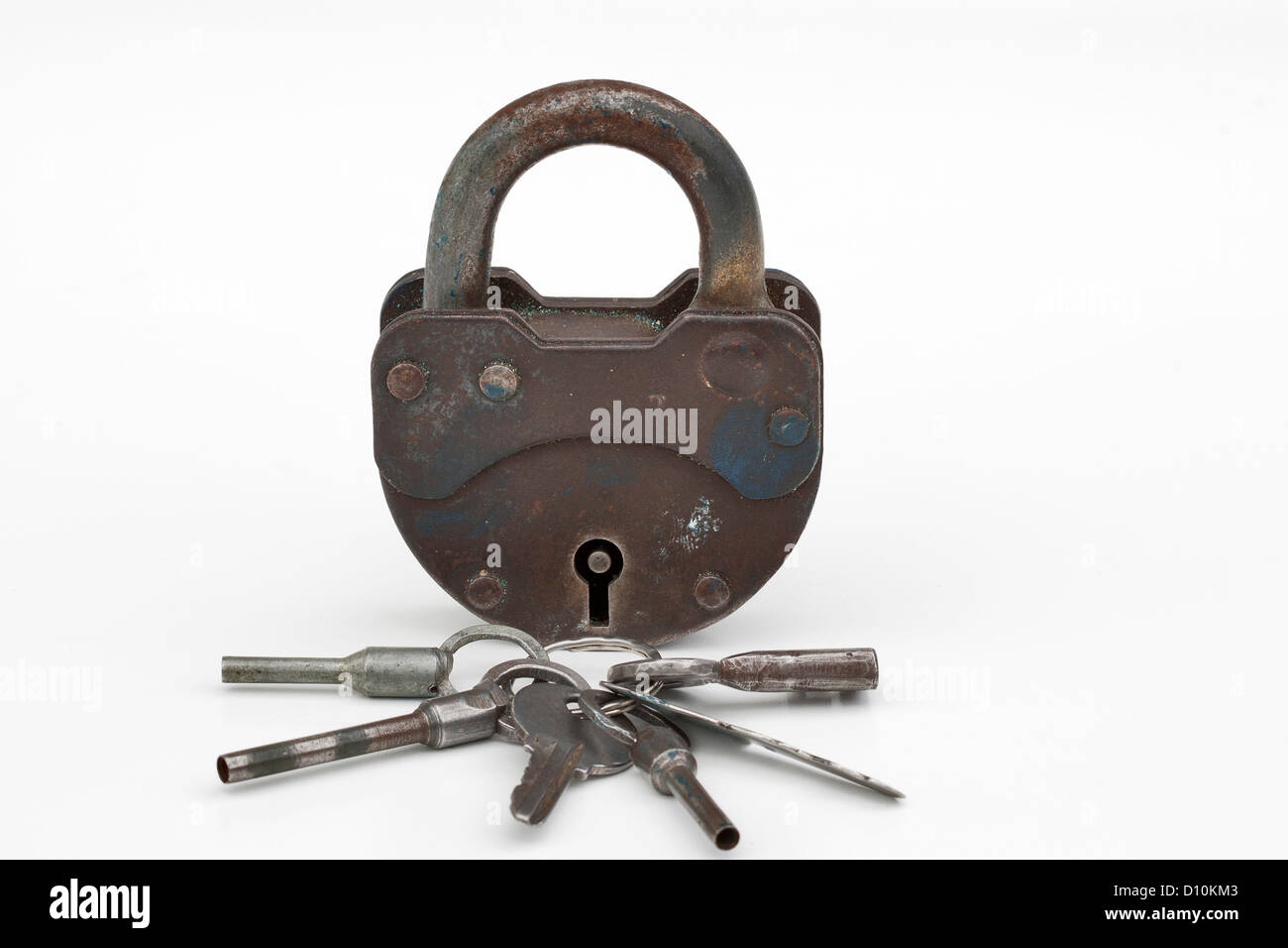Old rusty padlock and set of six keys against white background Stock ...
