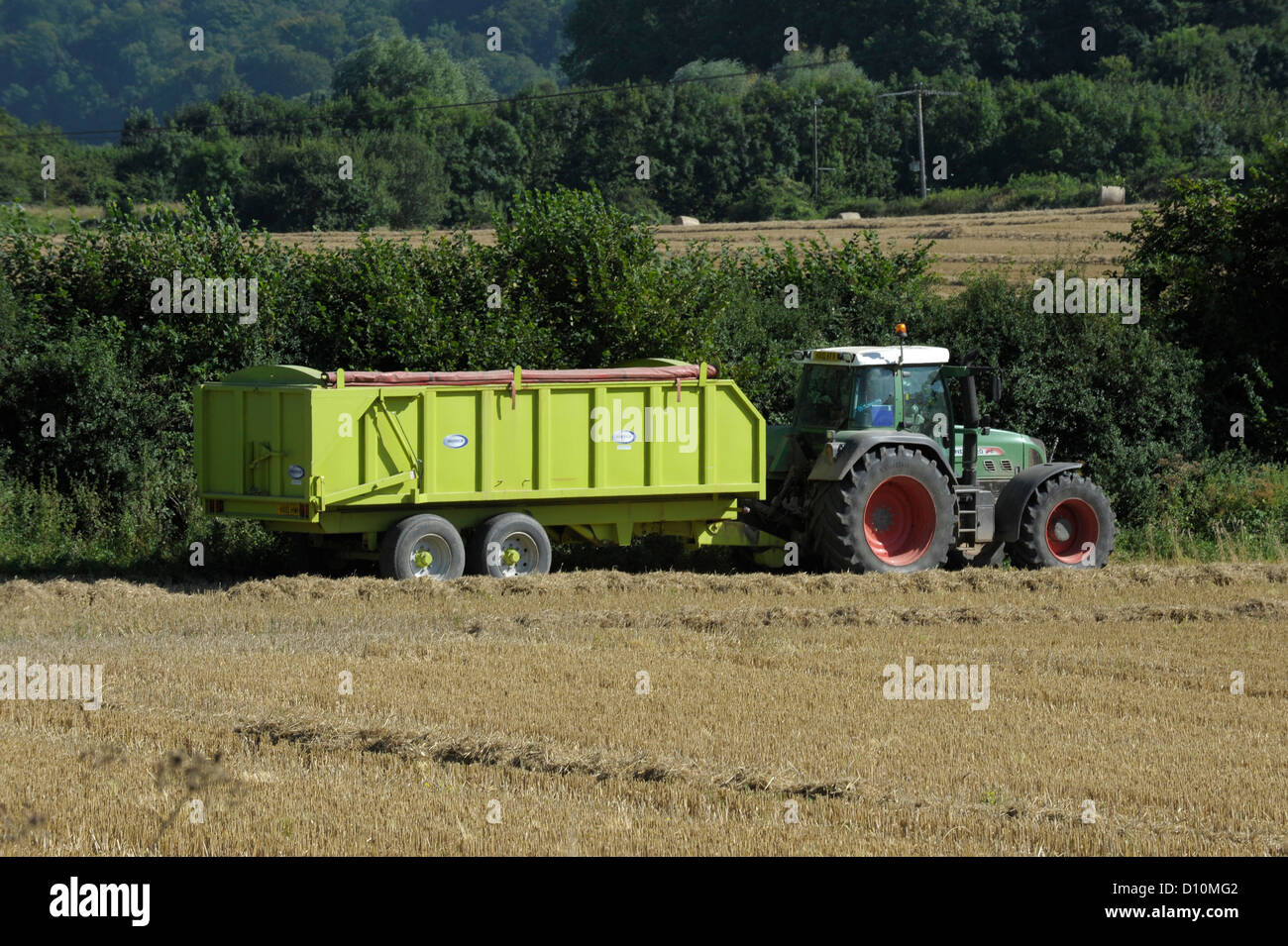 Tractor and grain trailer during harvesting. Hampshire, England Stock ...