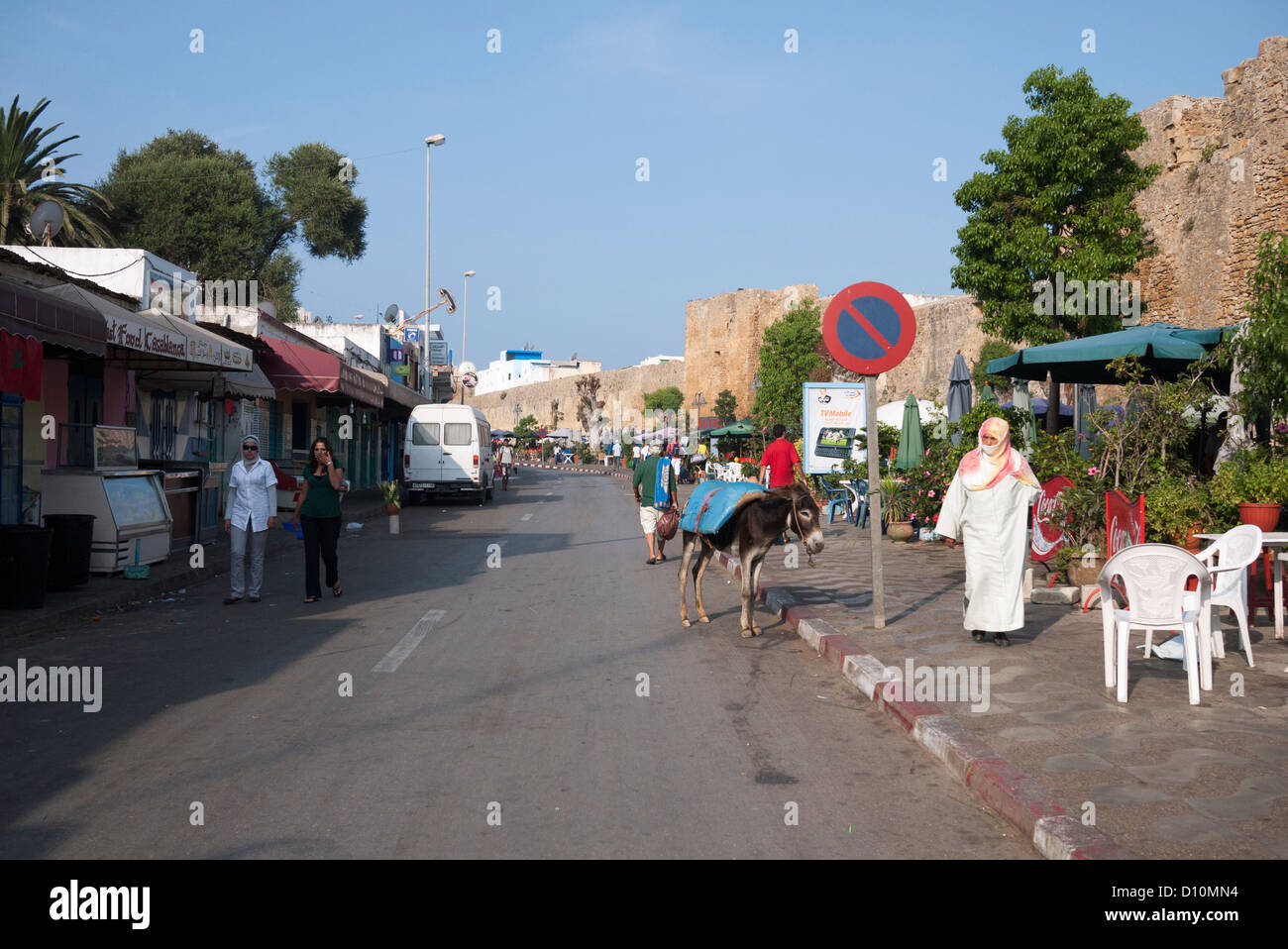 Woman donkey in street hi-res stock photography and images - Alamy