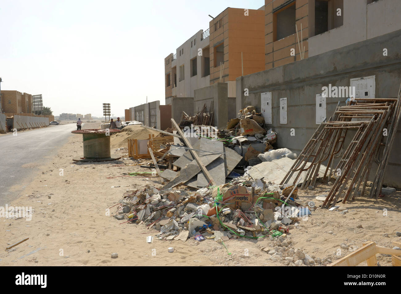 Rubbish outside a construction site in Qatar, Doha Stock Photo - Alamy