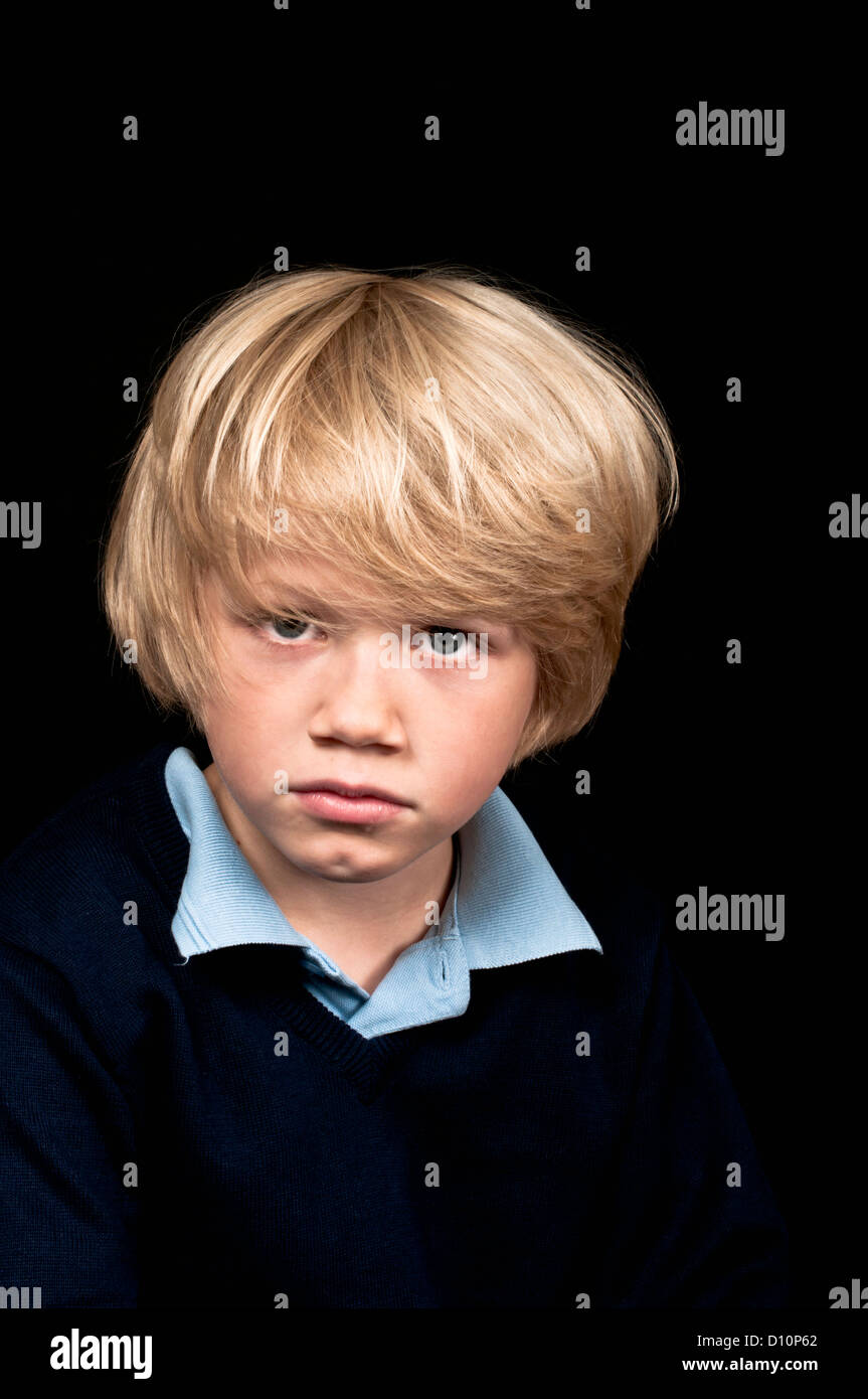 A frightened school boy Stock Photo - Alamy