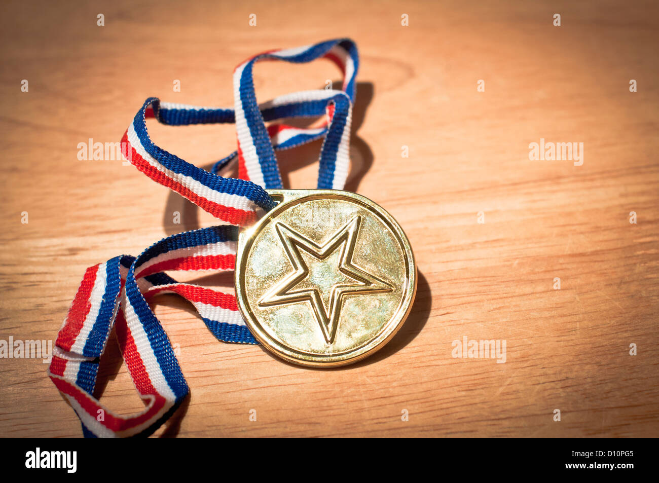 A winners gold medal Stock Photo - Alamy