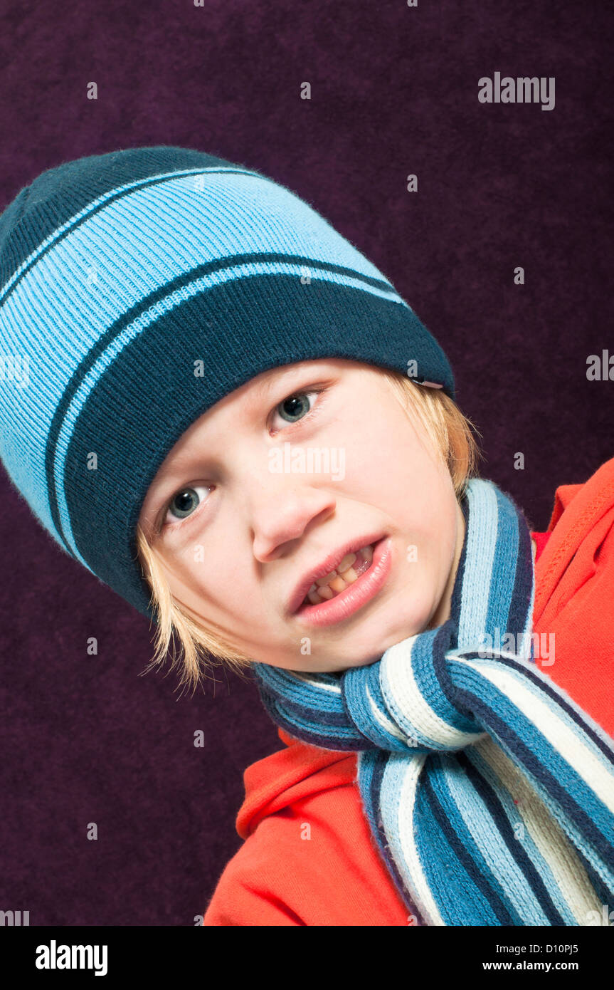 Cute boy in fashionable winter clothes Stock Photo - Alamy