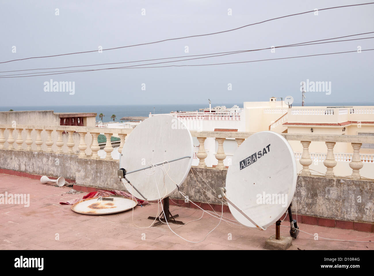 Satellite disk on roof terrace Stock Photo - Alamy
