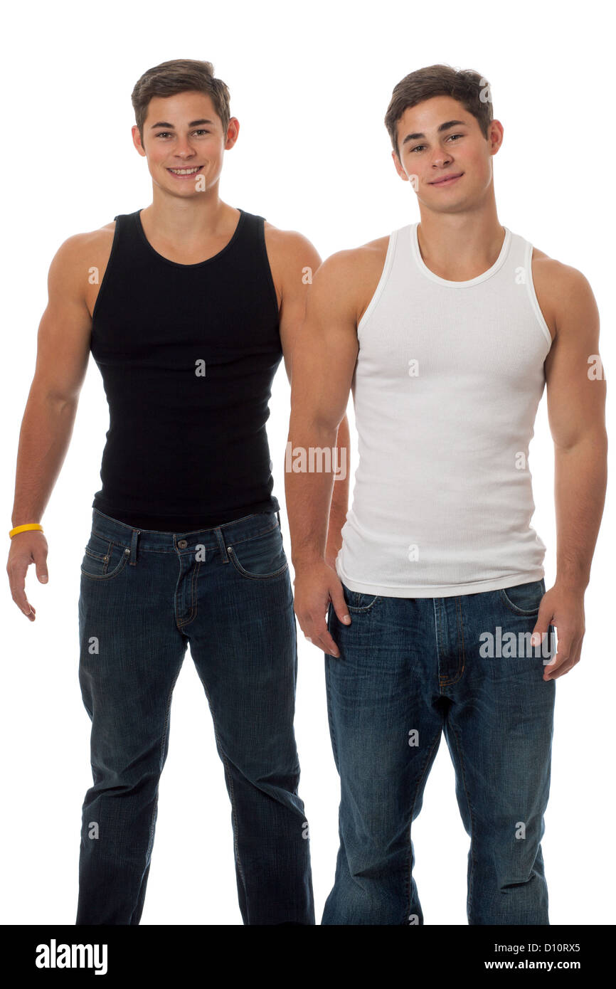 Casual twin brothers. Studio shot over white Stock Photo - Alamy