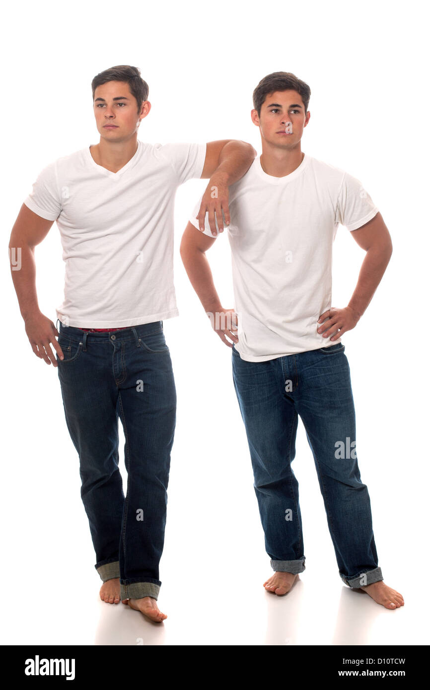 Twin brothers standing Cut Out Stock Images & Pictures - Alamy