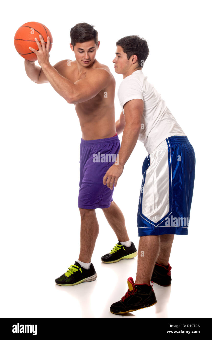 Male basketball players. Studio shot over white Stock Photo - Alamy