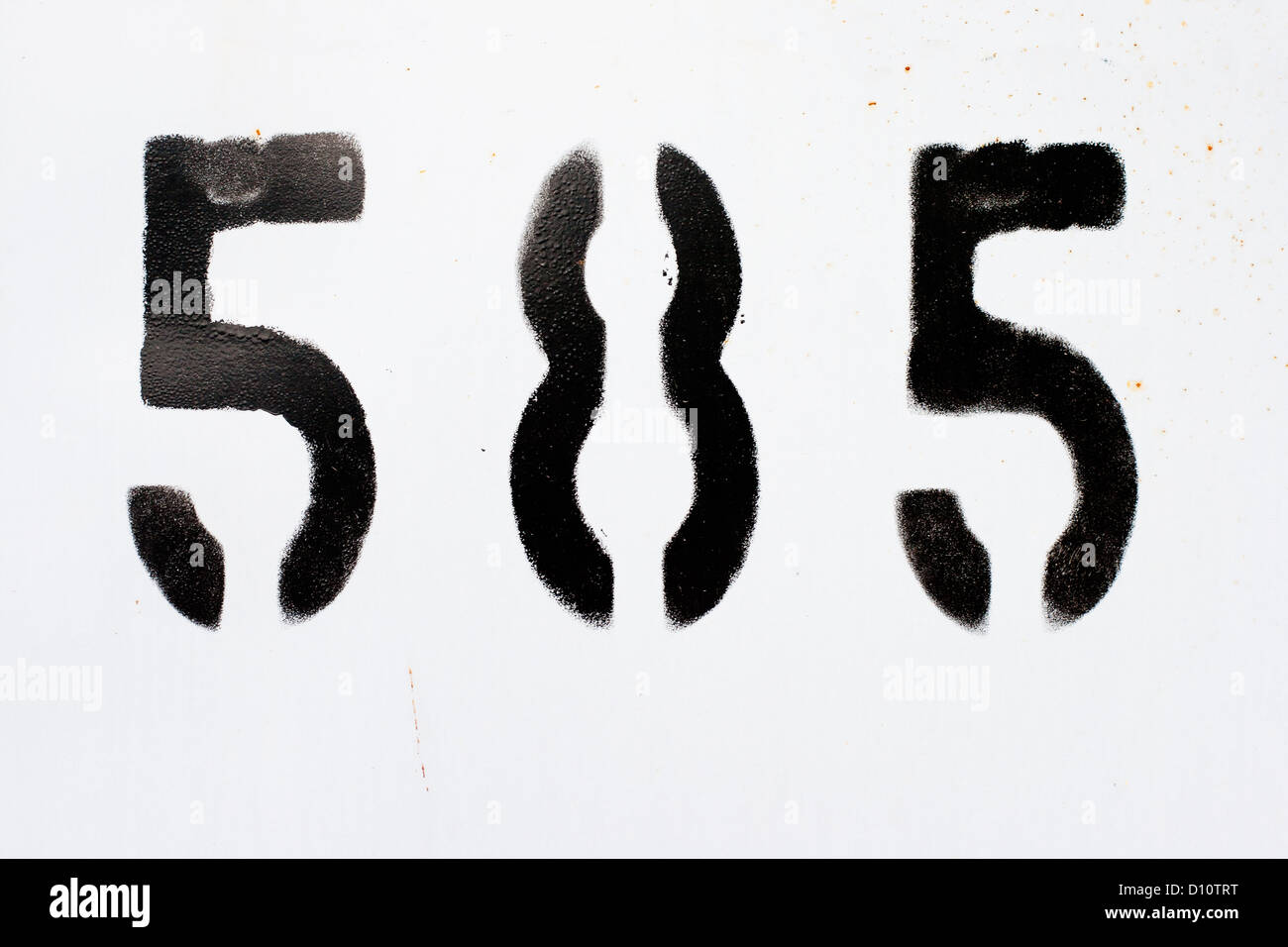 A close up on red stenciled number five hundred and eighty five Stock ...