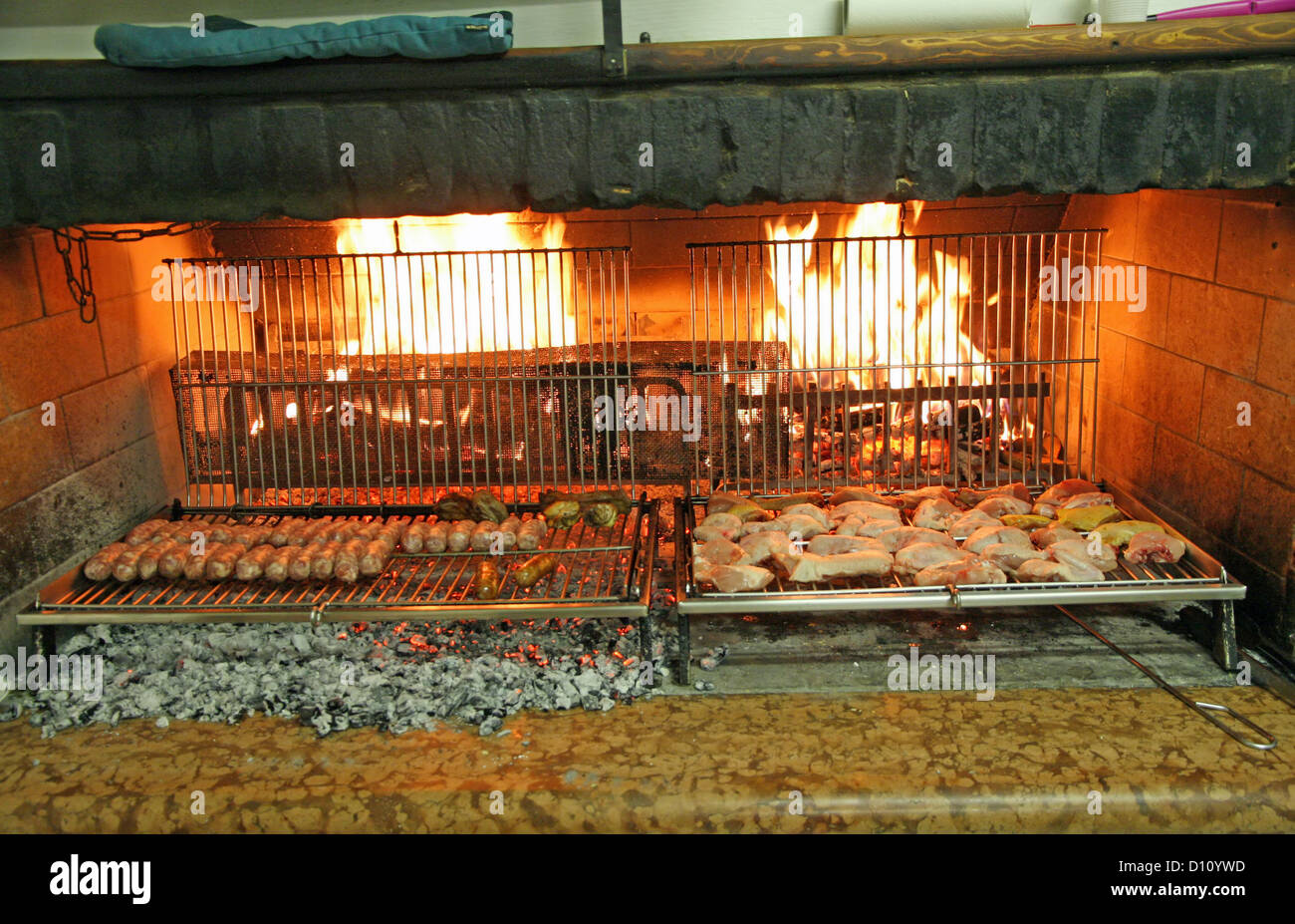 fireplace with hearth and grilled meat over an open fire Stock Photo ...