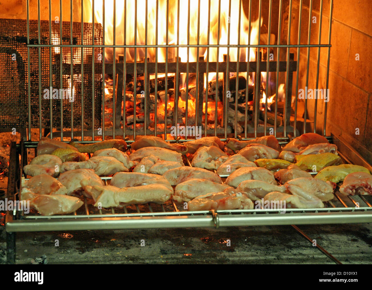 fireplace and grilled meat over an open fire Stock Photo - Alamy