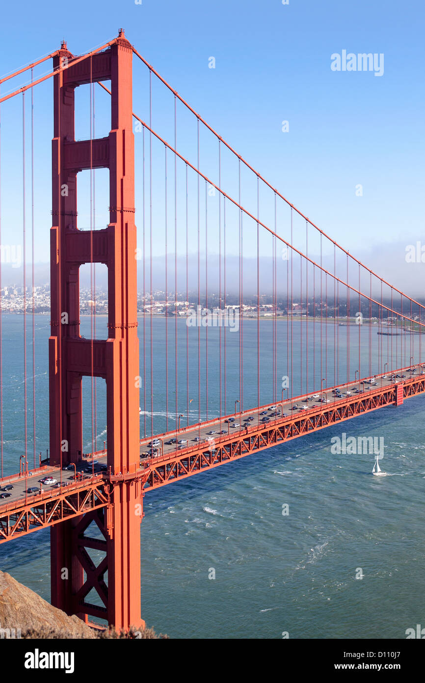 The San Francisco Golden Gate Bridge, pedestrians walking across the ...