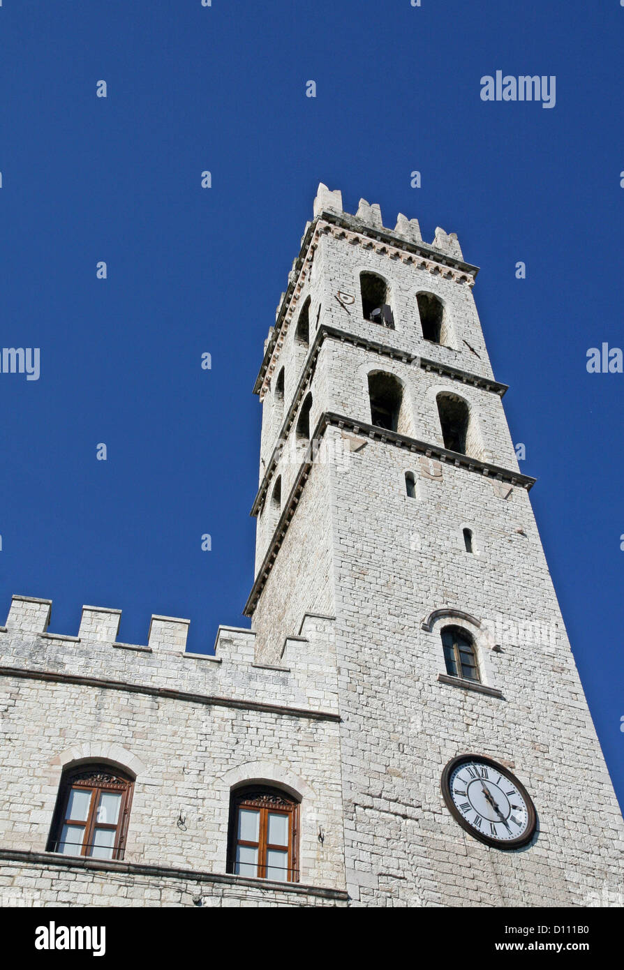ancient medieval tower with a clock and lace in the center of an ...
