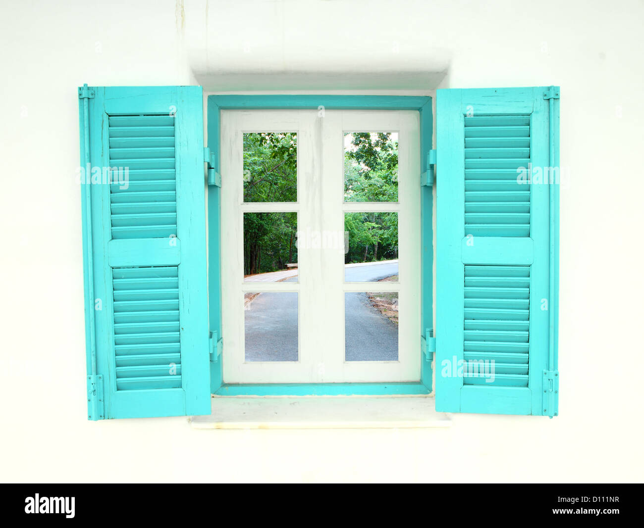 Greek style windows with curve road view Stock Photo - Alamy