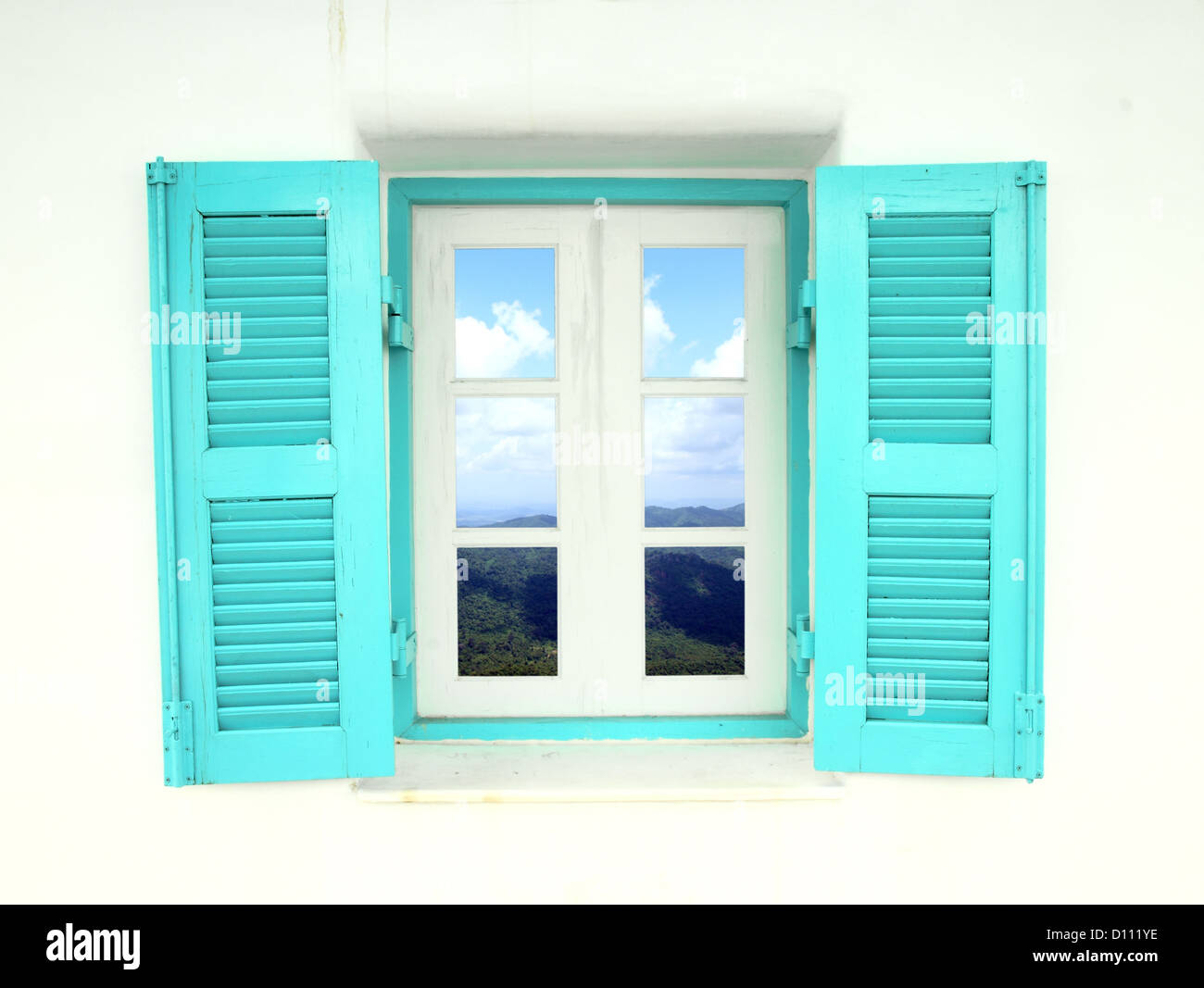 blue Greek style window with mountain and sky view Stock Photo - Alamy