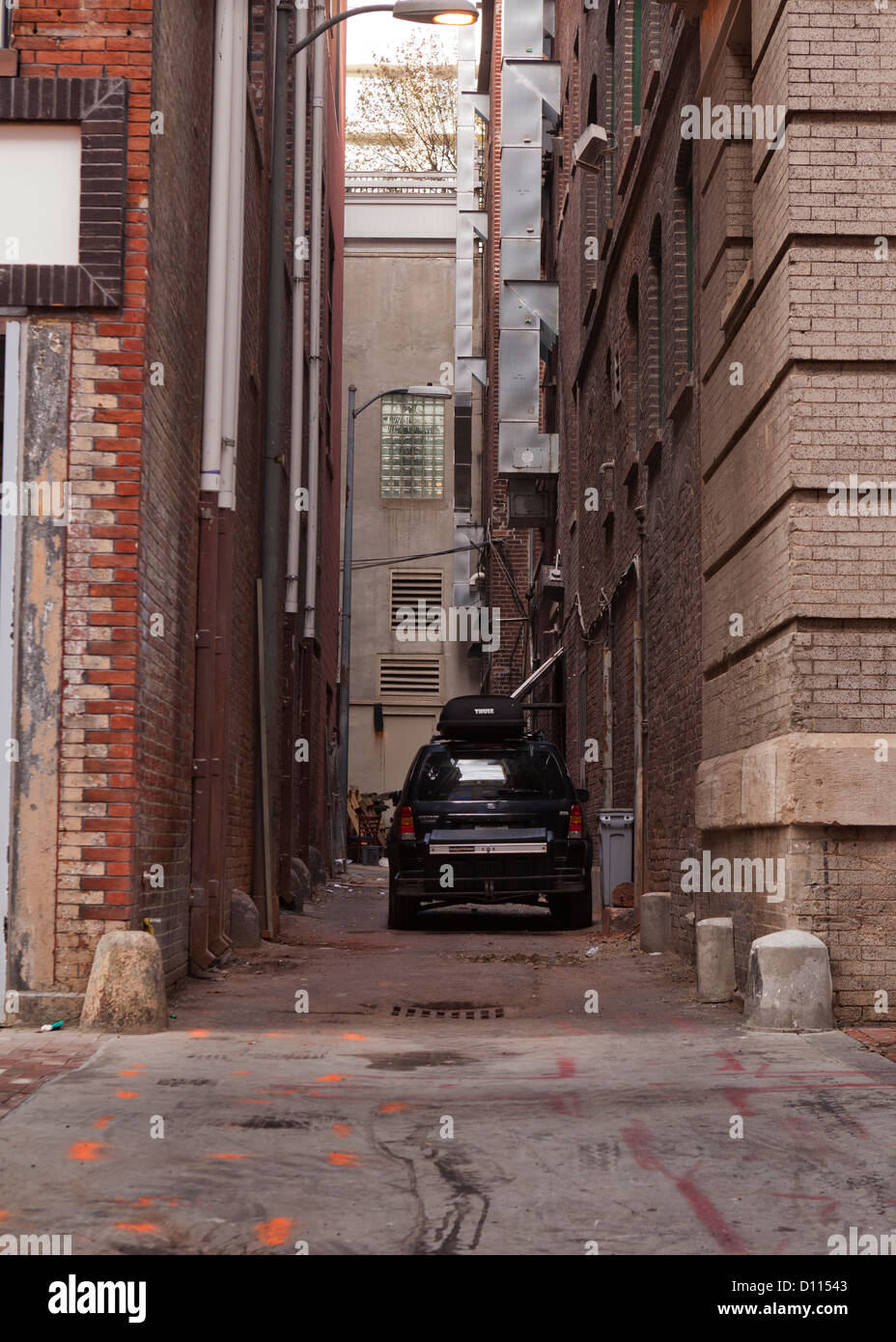 Car in narrow alley Stock Photo - Alamy
