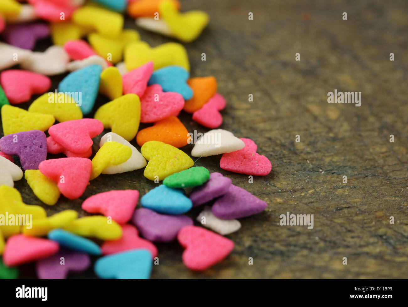 small sugar candy in the form of hearts Stock Photo - Alamy