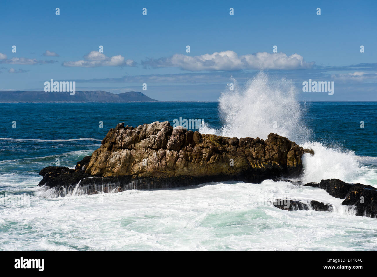 Wave crushing on rocks, Hermanus, South Africa Stock Photo - Alamy