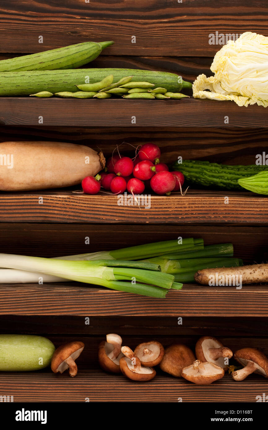 Various fresh vegetables on wooden shelf Stock Photo - Alamy