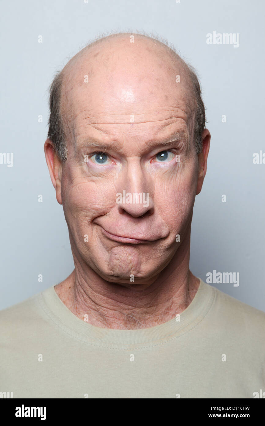 Bald man making funny face hi-res stock photography and images - Alamy