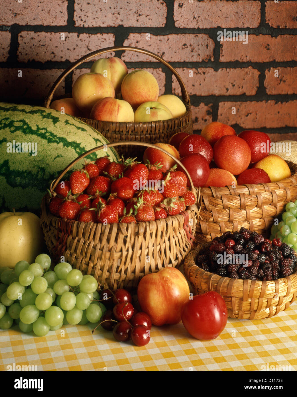 1980s BASKETS FULL OF FRESH SUMMER FRUITS BRICK WALL Stock Photo - Alamy