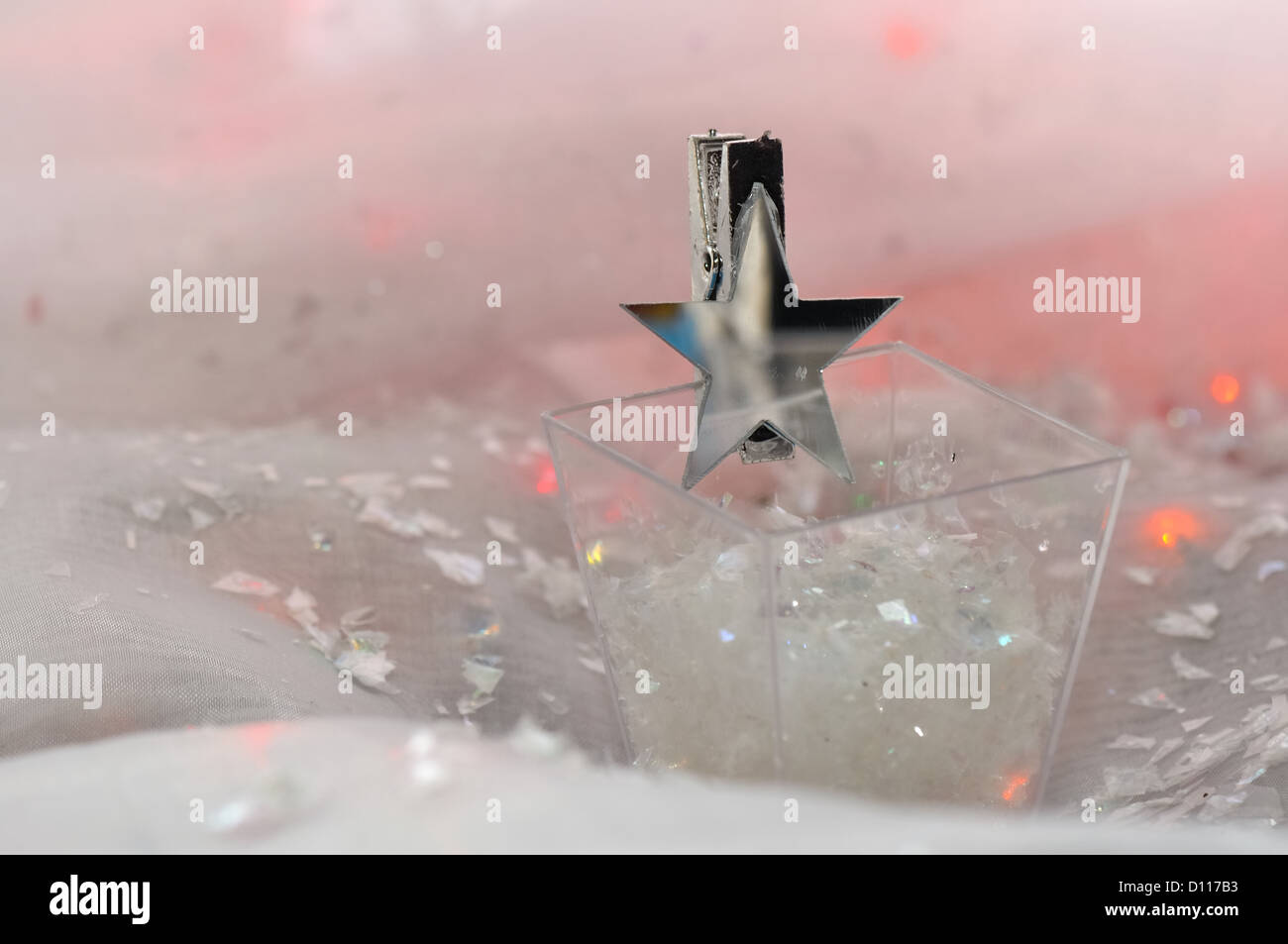 clip with star fixed a glass casing in Christmas decoration Stock Photo ...