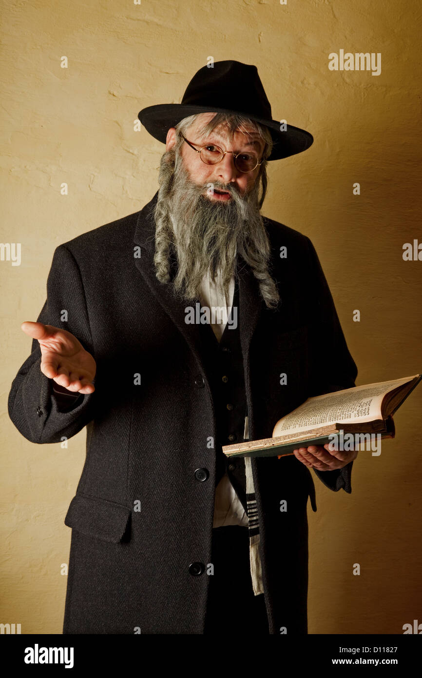 Old jewish man with grey beard holding a book Stock Photo - Alamy