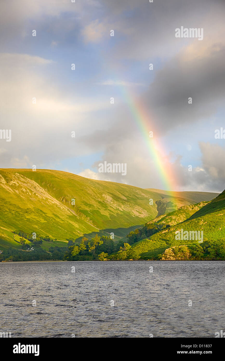 A rainbow provides a scenic backdrop to Ullswater, near Howtown Jetty ...