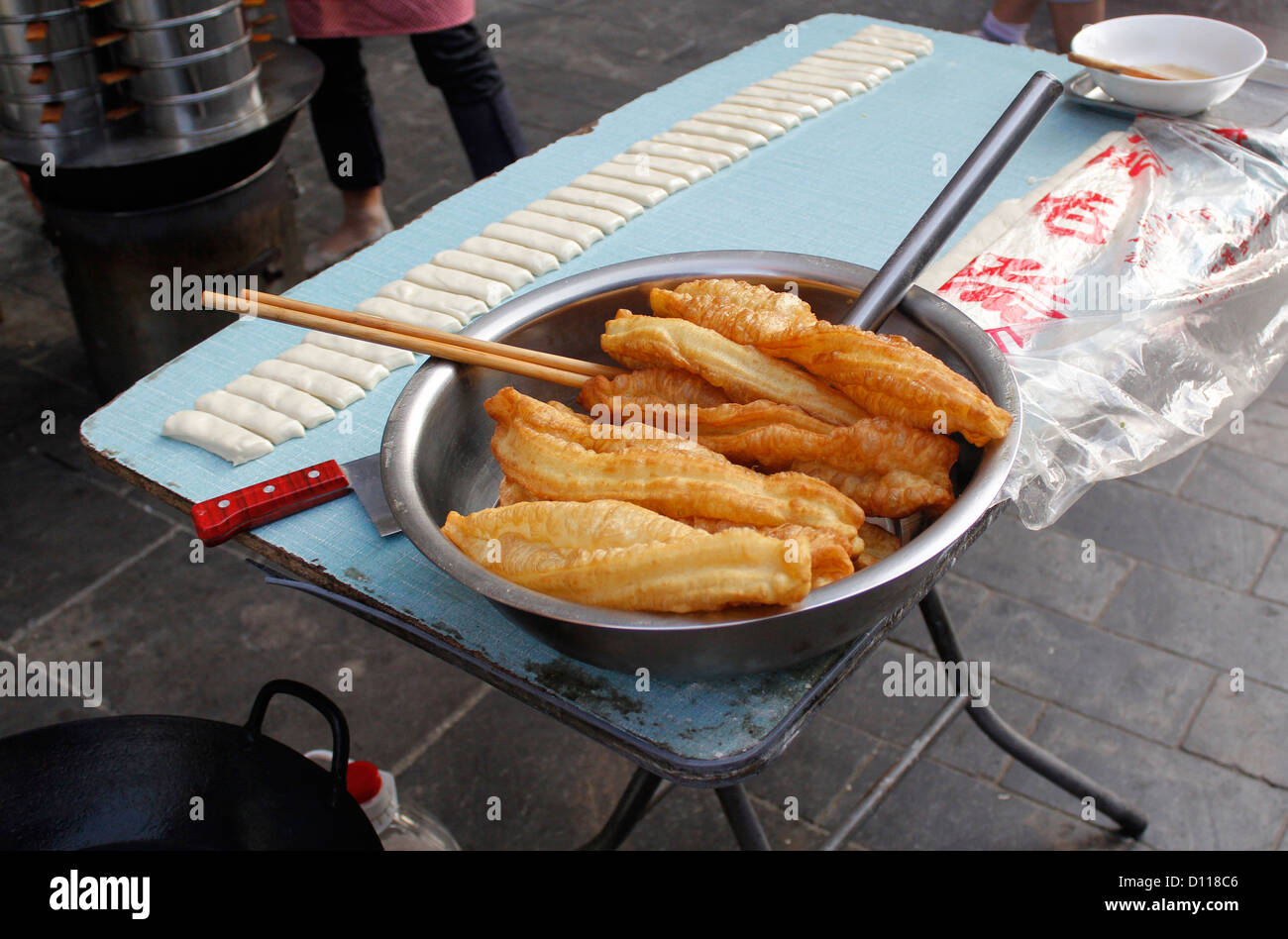 Traditional deep-fried Dough Sticks ( Youtiao ) in a Beijing China ...