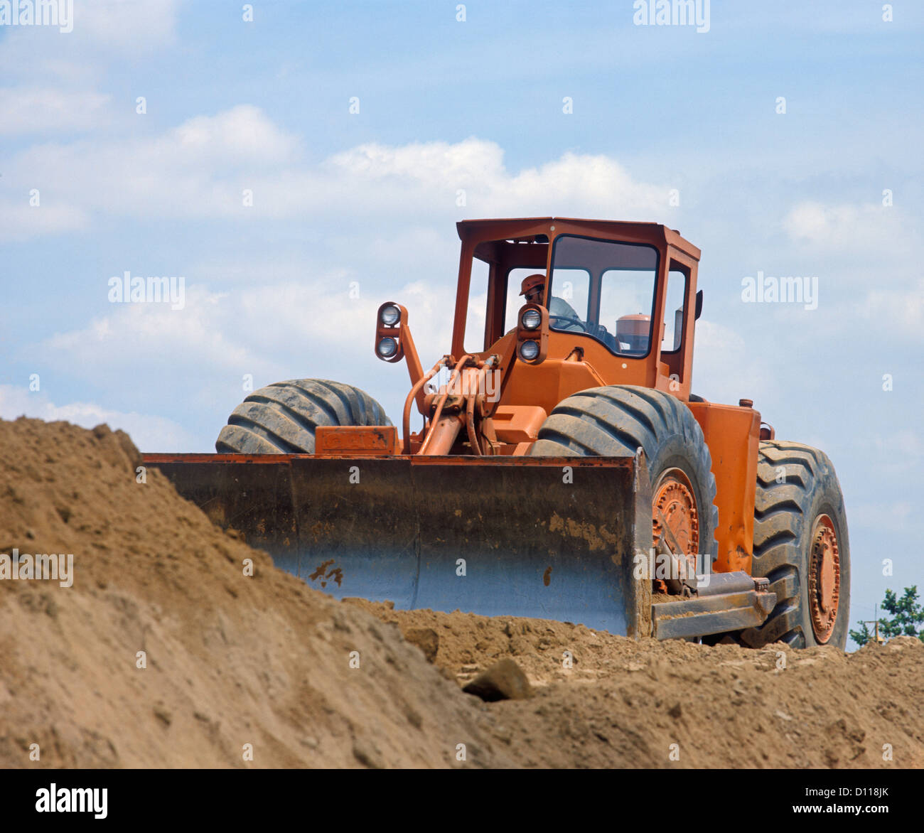 Cartoon Bulldozer Pushing Dirt