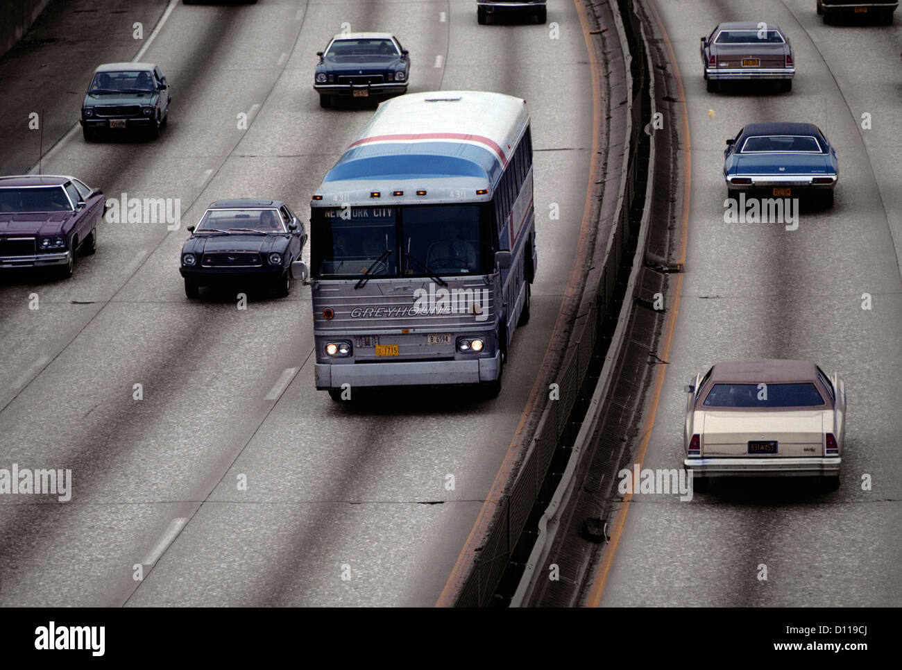 1970s TRAFFIC CARS BUS ON DIVIDED HIGHWAY Stock Photo - Alamy