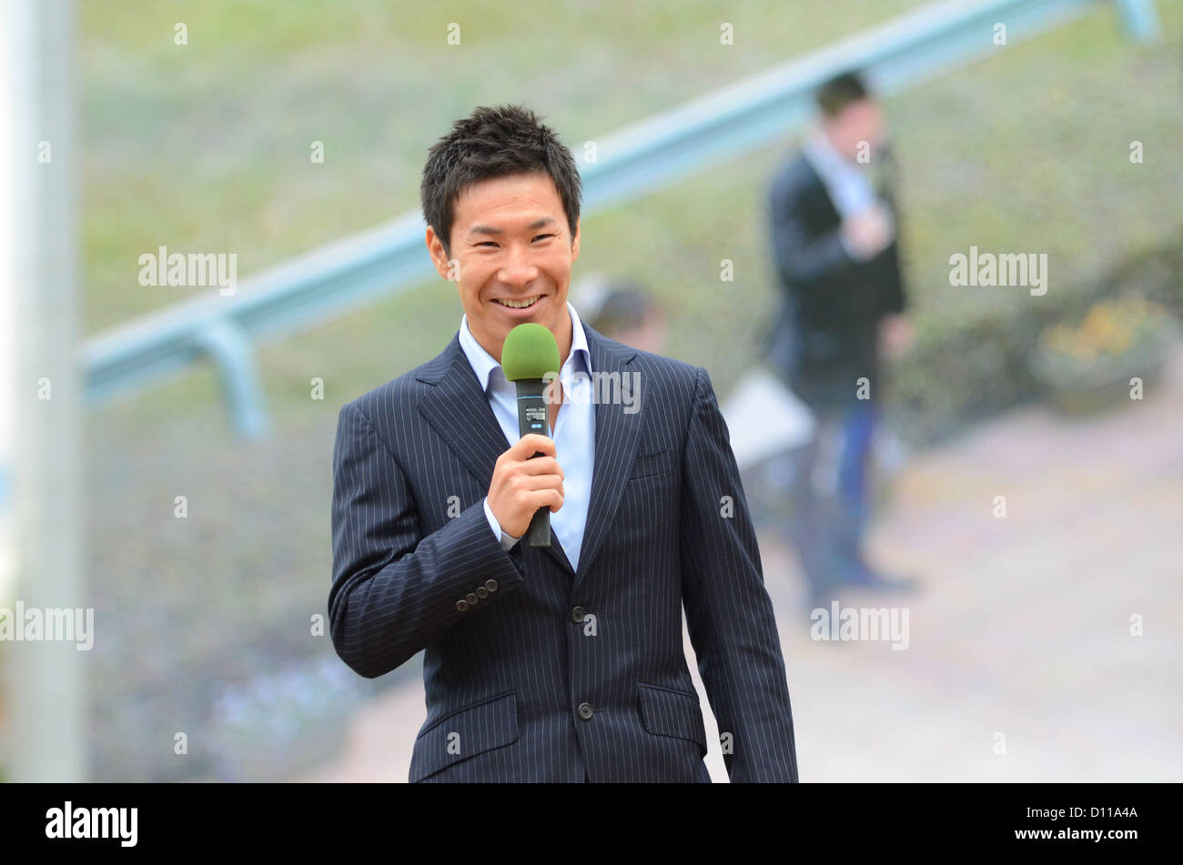 Japanese racing driver Kamui Kobayashi speaks during a special ...