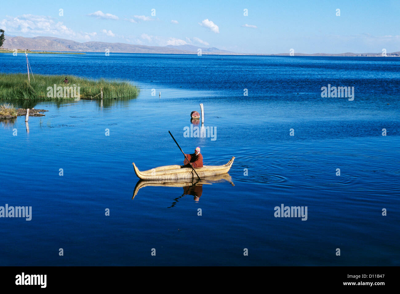 1990s BOLIVIA LAKE TITICACA AYMARA INDIAN MAN IN TOTORA REED BOAT Stock ...