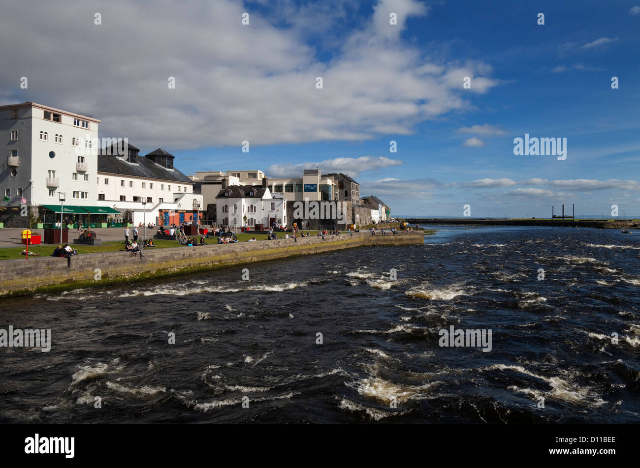 The River Corrib flowing past the Spanish Arch built 1584 and the Long Walk, Galway City ...