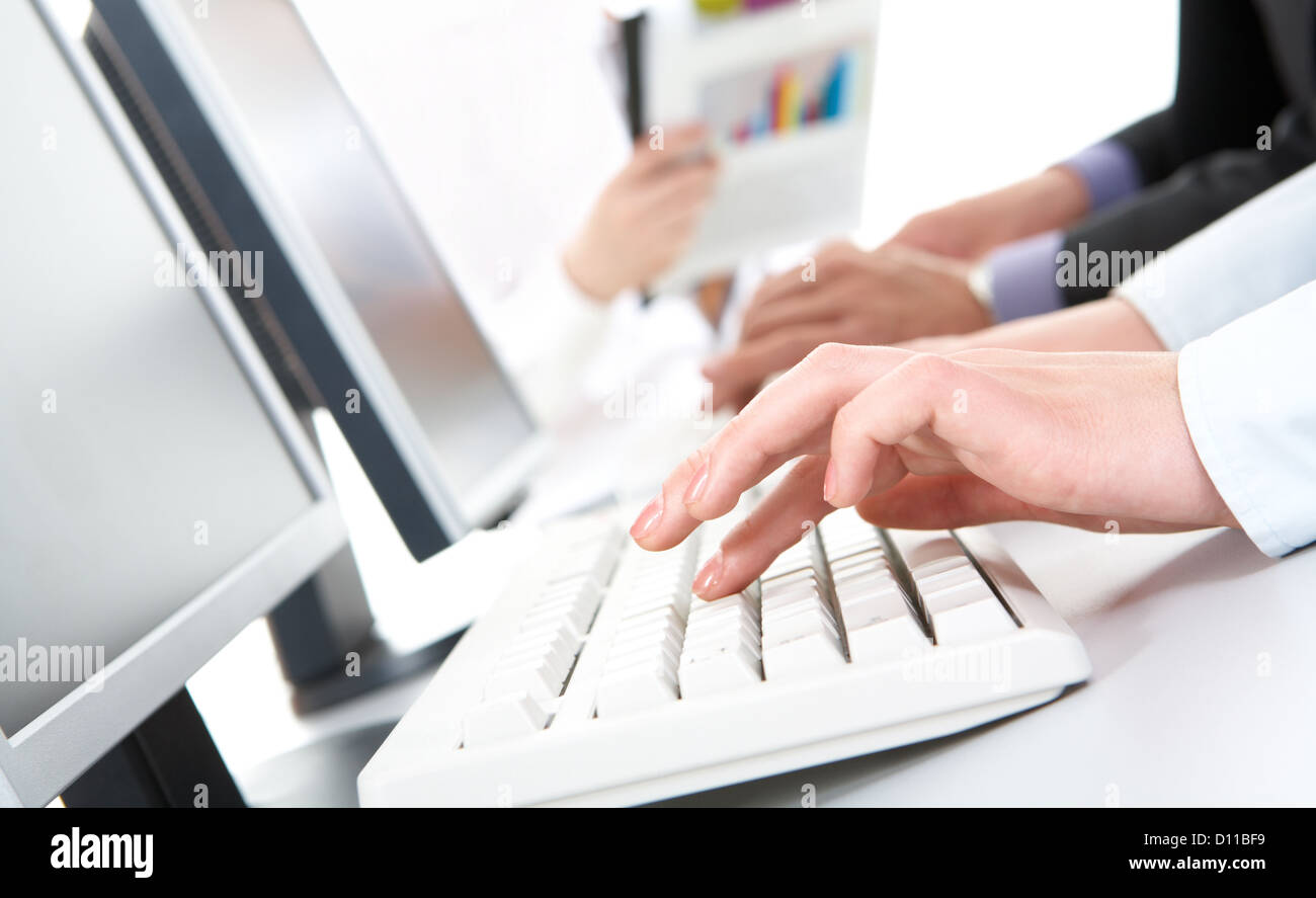 Photo of female hands typing on computer keyboard in working ...