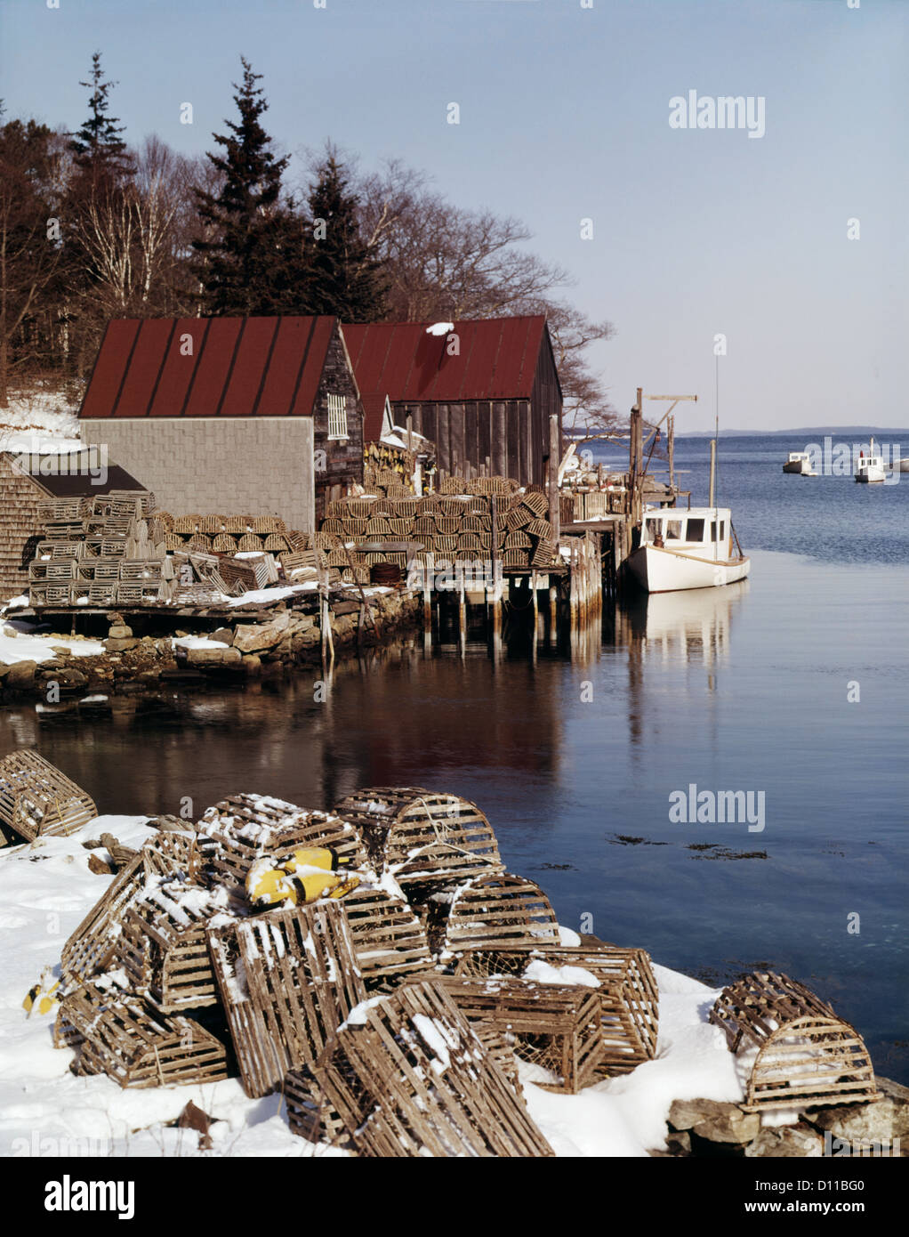 1970s WINTER SCENIC LOBSTER TRAPSUSA WITH SNOW IN BACK COVE NEW HARBOR ...