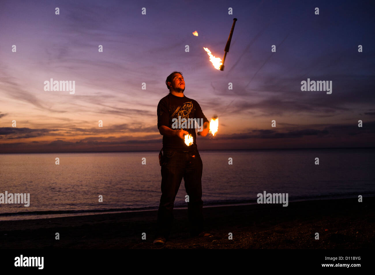 Fire juggler beach hi-res stock photography and images - Alamy