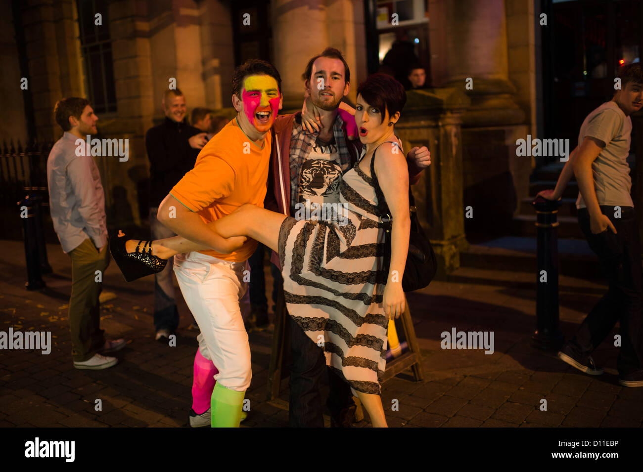 Young people out partying on a saturday night on the streets of ...